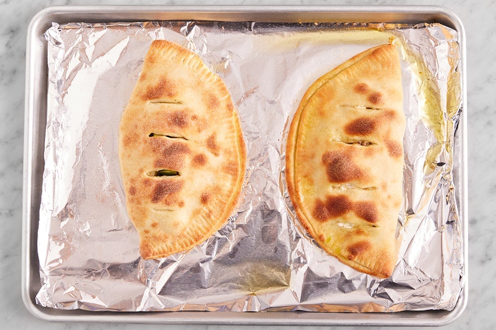 Recipe: Three Cheese Calzones with Zucchini & Golden Raisins - Blue Apron